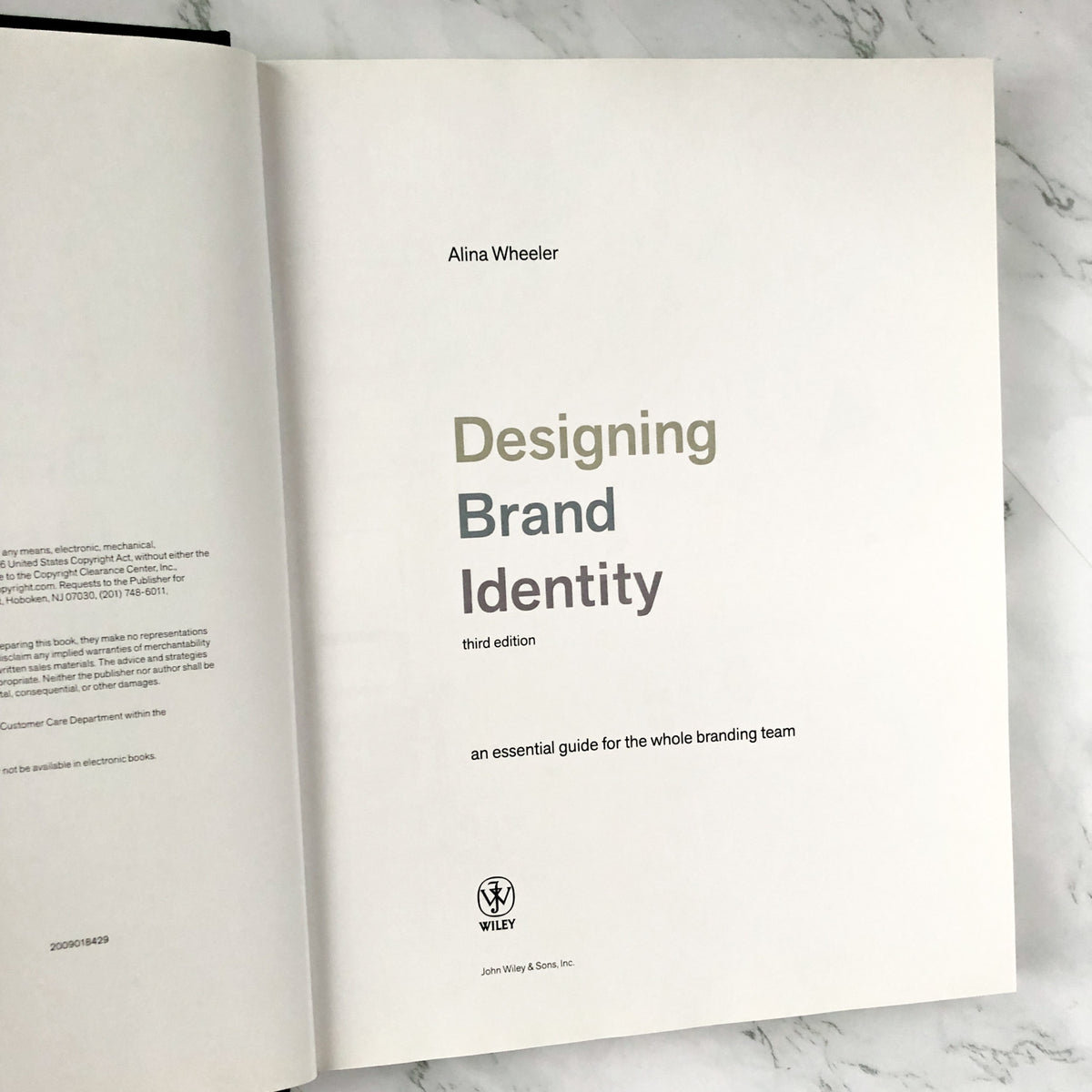 Designing Brand Identity by Alina Wheeler [THIRD EDITION] 2008 • John